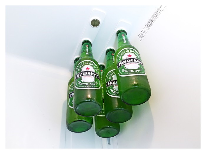 The BottleLoft sticks your beer to the fridge ceiling, freeing up shelves