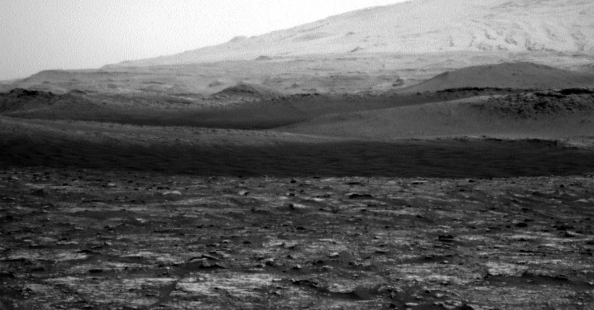 NASA Rover Captures Shadowy Dust Devil Whirling Around Mars